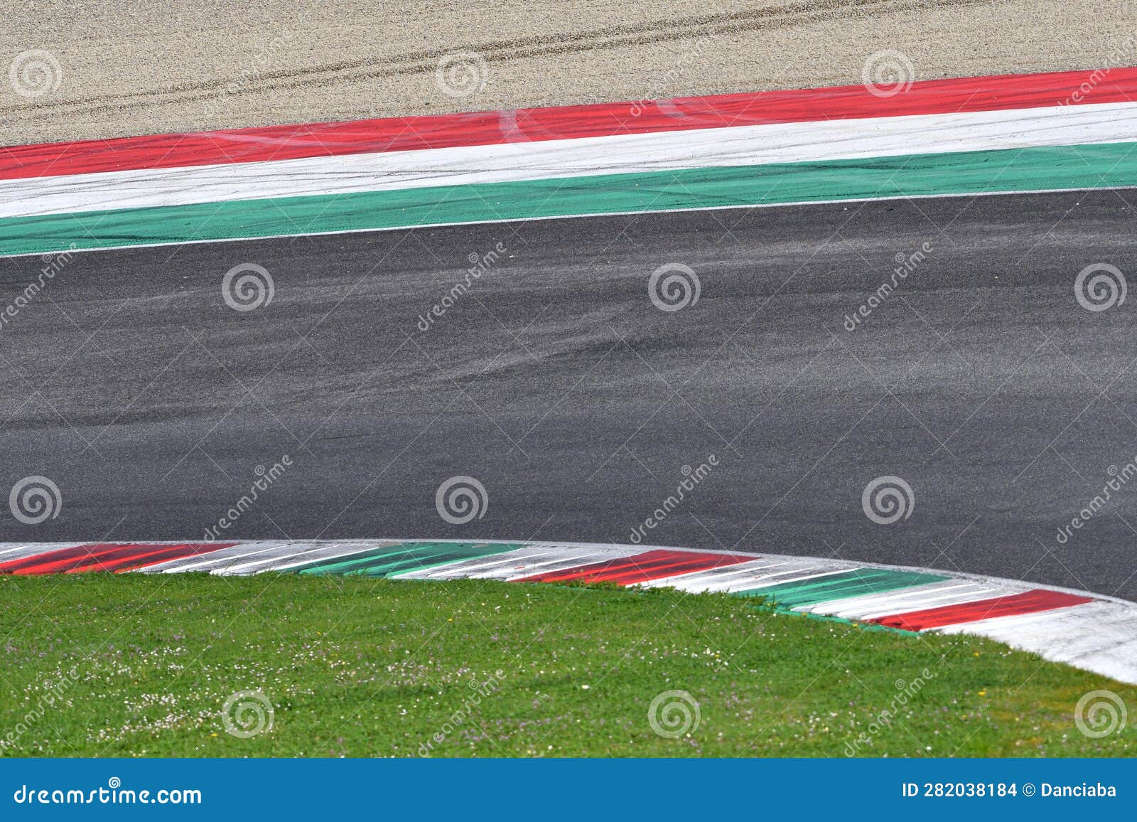 Colored Curbs on a Racing Track Stock Photo - Image of grass, curbs ...