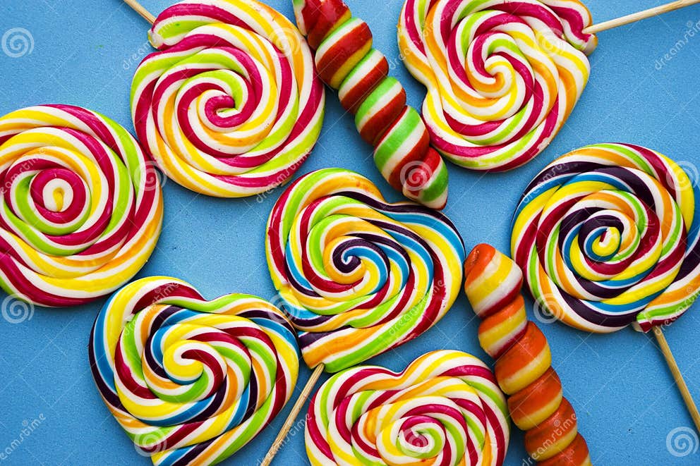 Colored, Different Sweets, Lollipops on a Blue Background. Sweets ...
