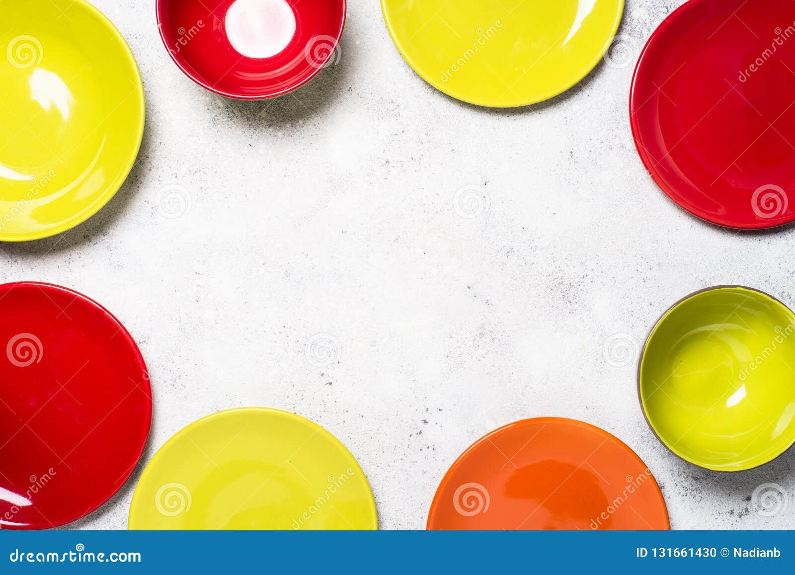 Colored Dinnerware - Red and Green Plates on Light Stone Table. Stock ...