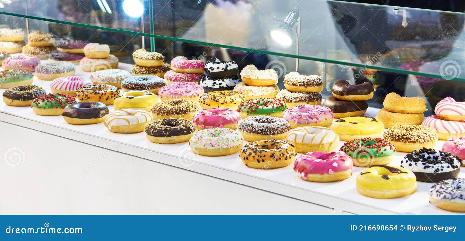 Colored Donuts on Shop Window Stock Photo - Image of shop, bakery ...