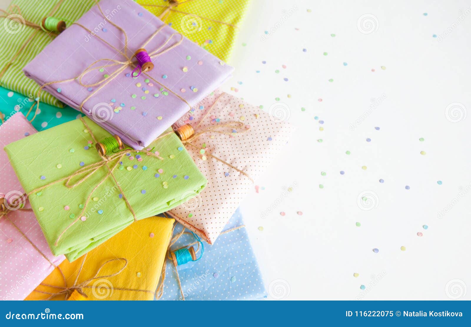 Colored Fabric Folded Stack. Needle Bed, Scissors, Measuring Tap Stock ...