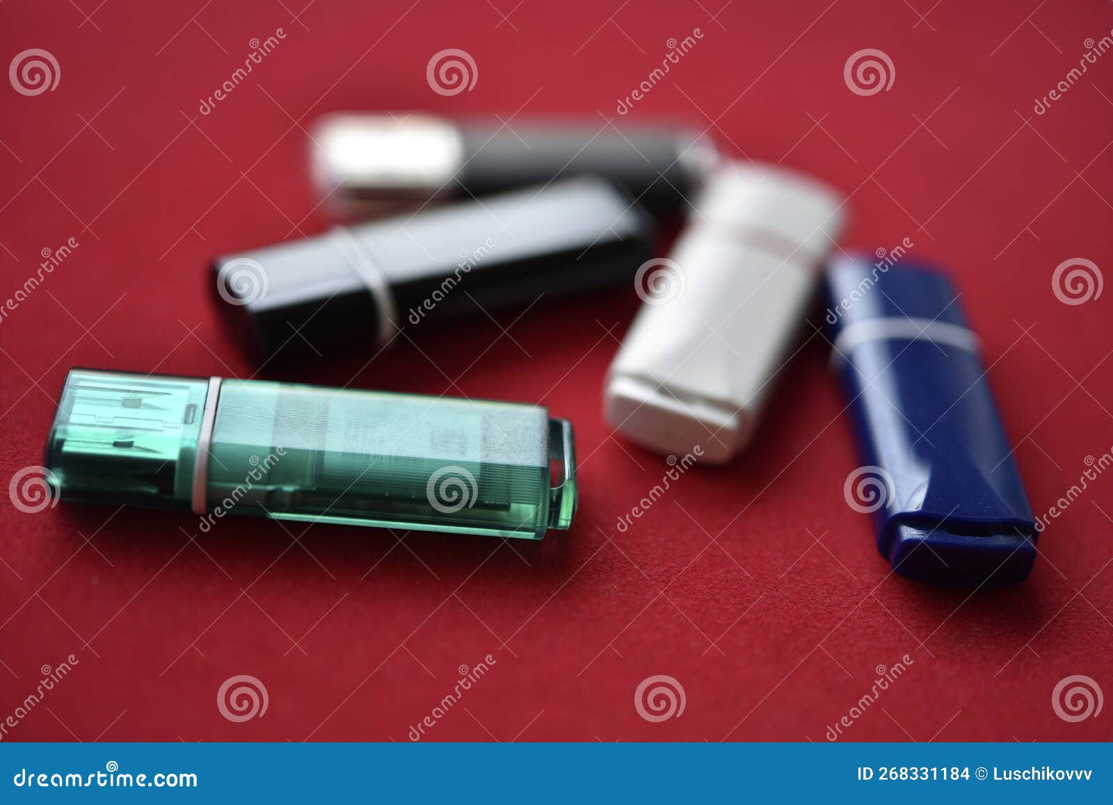 Colored Flash Drives on a Red Background. Storage of Information Stock ...