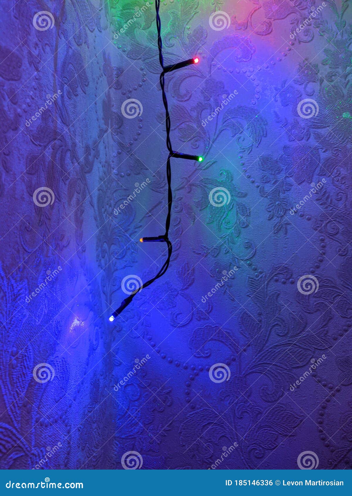 Colored Garland Shines in Different Colors and is Reflected from the ...