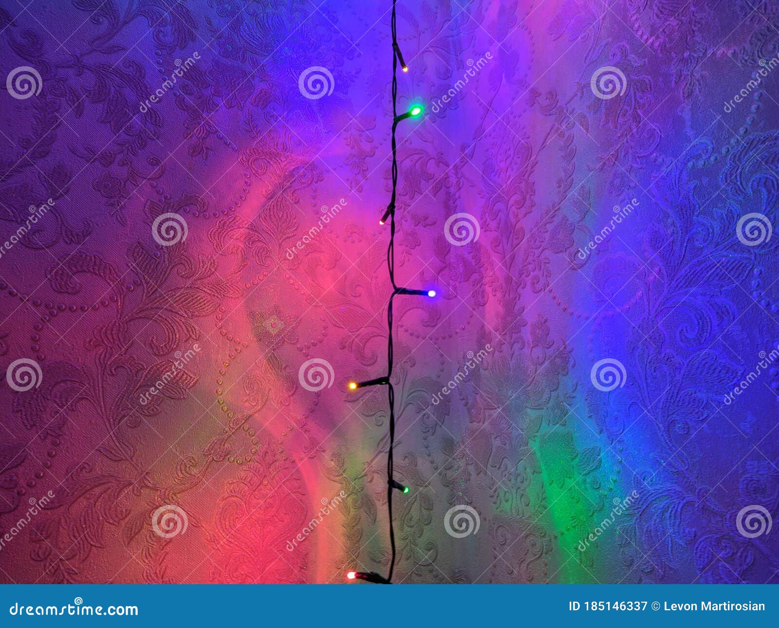 Colored Garland Shines in Different Colors and is Reflected from the ...