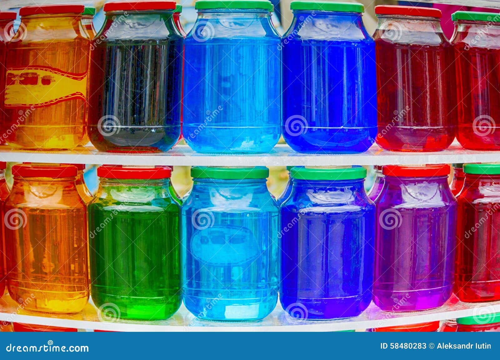 Colored glass jars stock image. Image of green, storage - 58480283