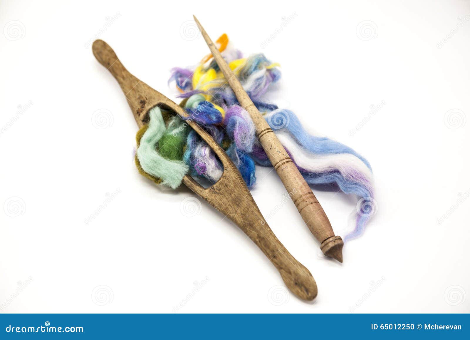 Colored Hair and Old Spindle Close-up on White Background. Tools for ...