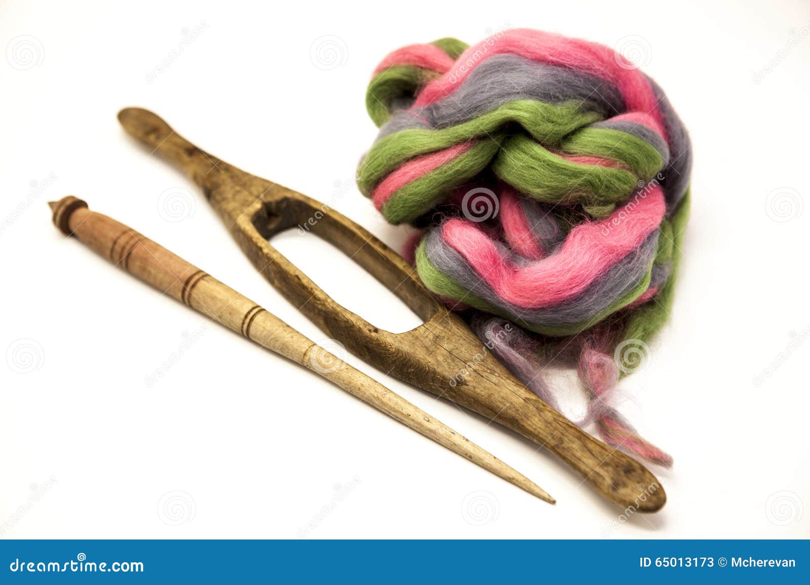 Colored Hair and Old Spindle Close-up on White Background. Tools for ...