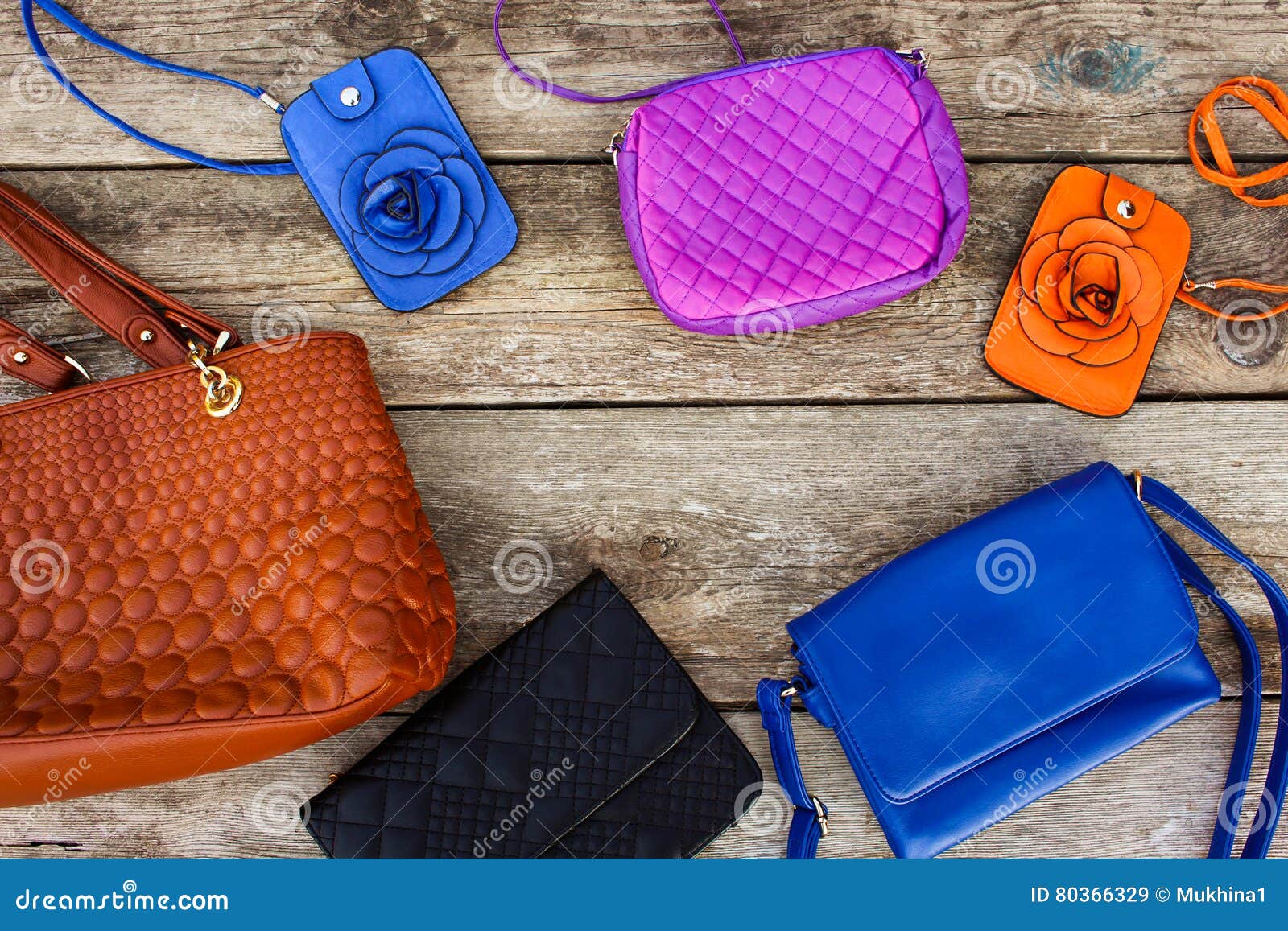 Colored Handbags on Wooden Background Stock Image - Image of colour ...