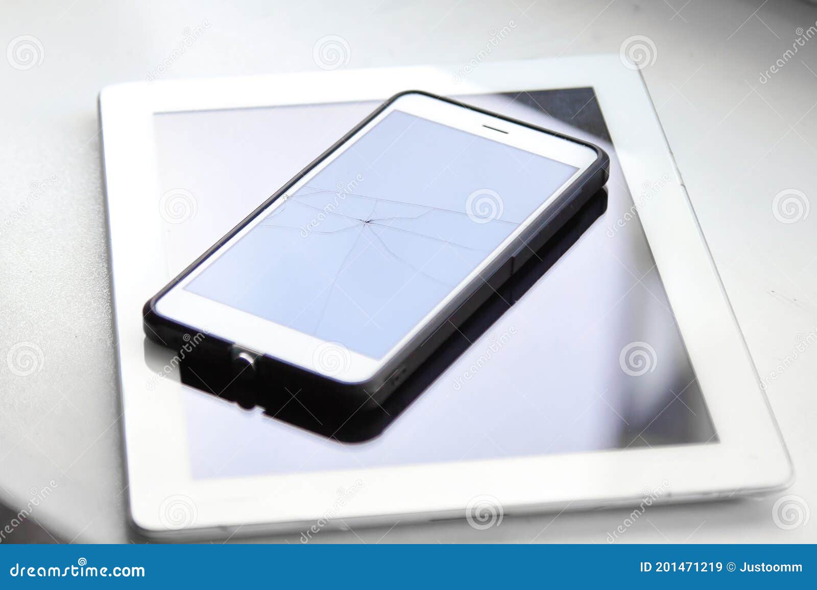 Colored Highlights of a Broken Mobile Phone Screen in the Reflection of ...