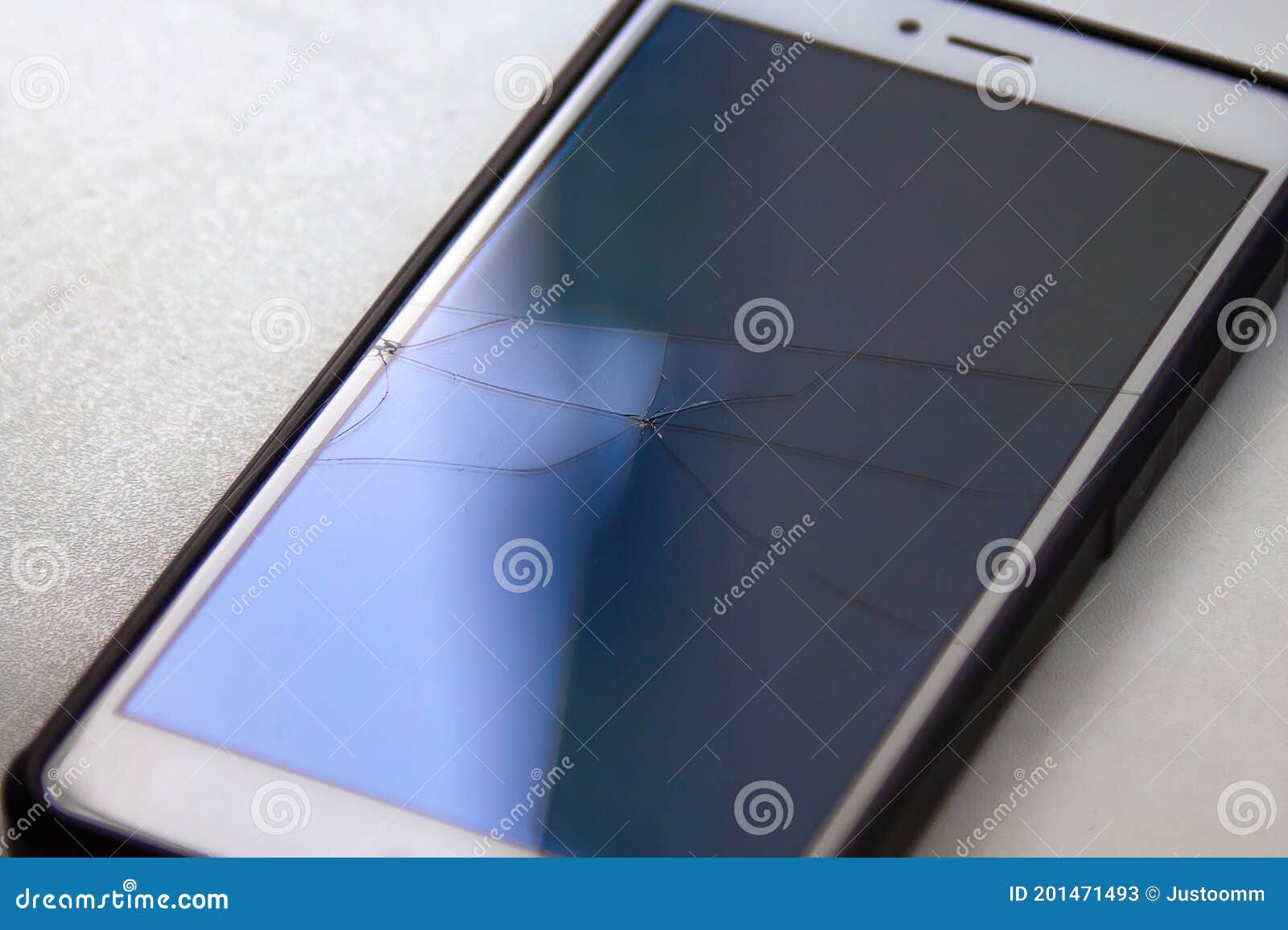 Colored Highlights of a Broken Mobile Phone Screen in the Reflection of ...