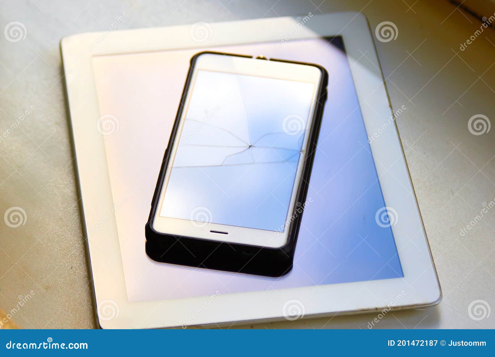 Colored Highlights of a Broken Mobile Phone Screen in the Reflection of ...