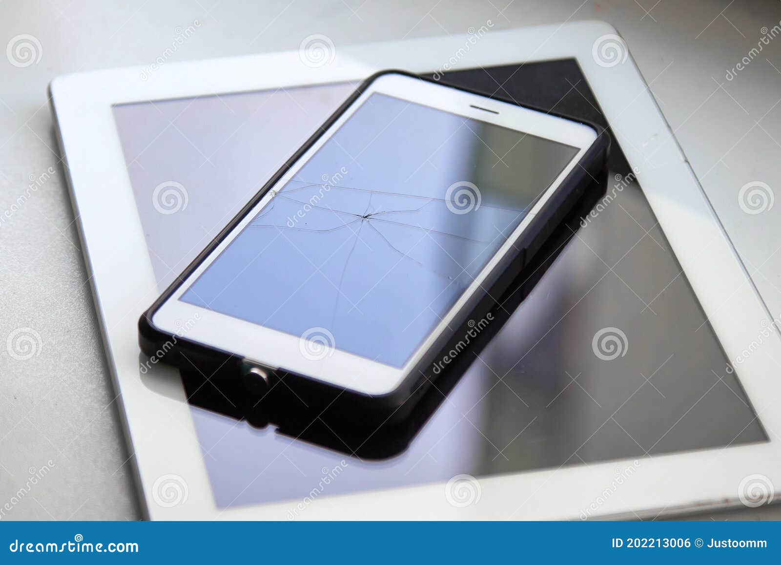 Colored Highlights of a Broken Mobile Phone Screen in the Reflection of ...