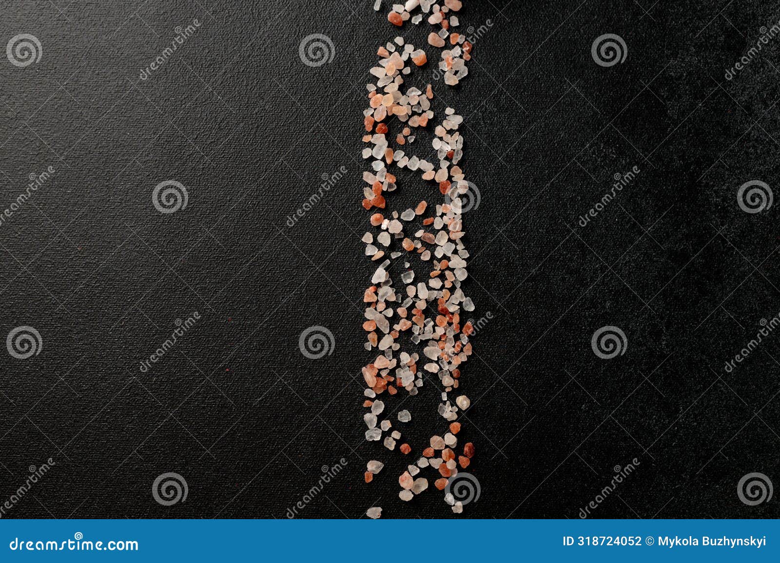 Colored Himalayan Salt on a Black Background. Straight Line Space for ...