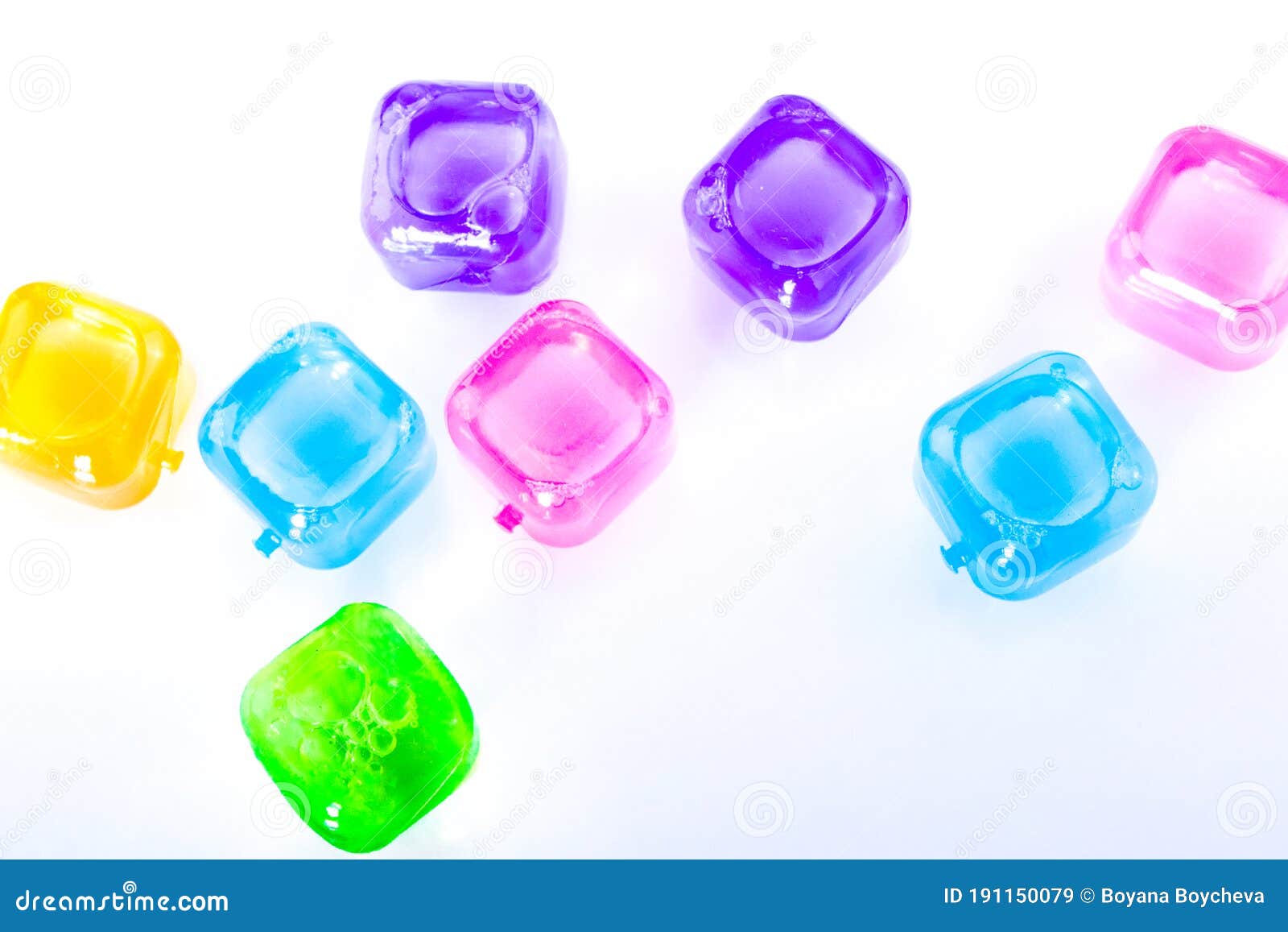 Coloured Ice Cubes Reflected in Glass on a White Background Stock Image ...