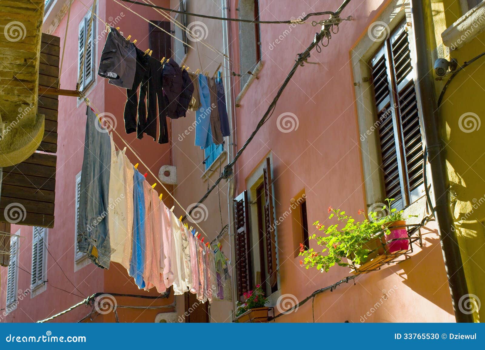 Colored Laundry Hanging Out on a Clothesline Stock Photo - Image of ...