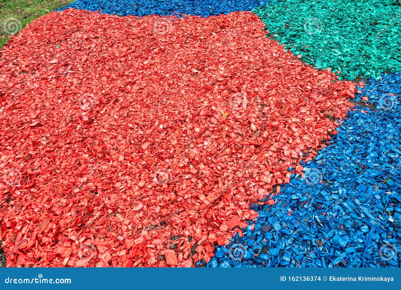Colored Layers of Wooden Mulch on Surface of Lawn Stock Photo - Image ...