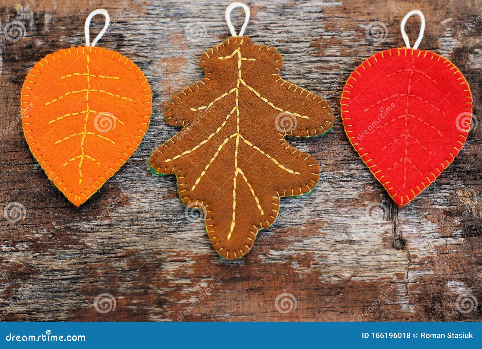Colored Leaves on a Wooden Background. Handmade Leaves Stock Photo ...