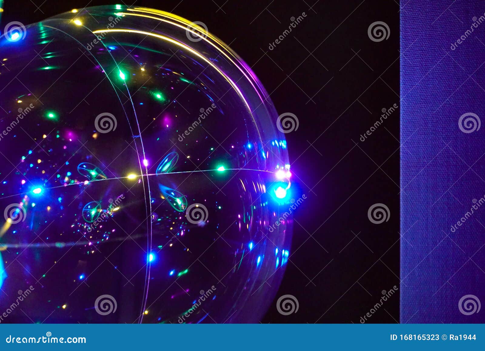 Colored Lights in the Form of a Sphere on a Dark Background. Abstract ...