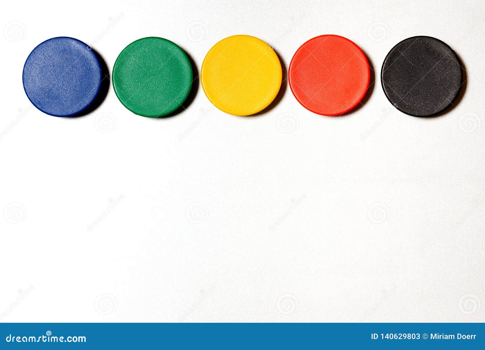 Colored Magnets on Metal Wall with Copy Space Stock Image - Image of ...