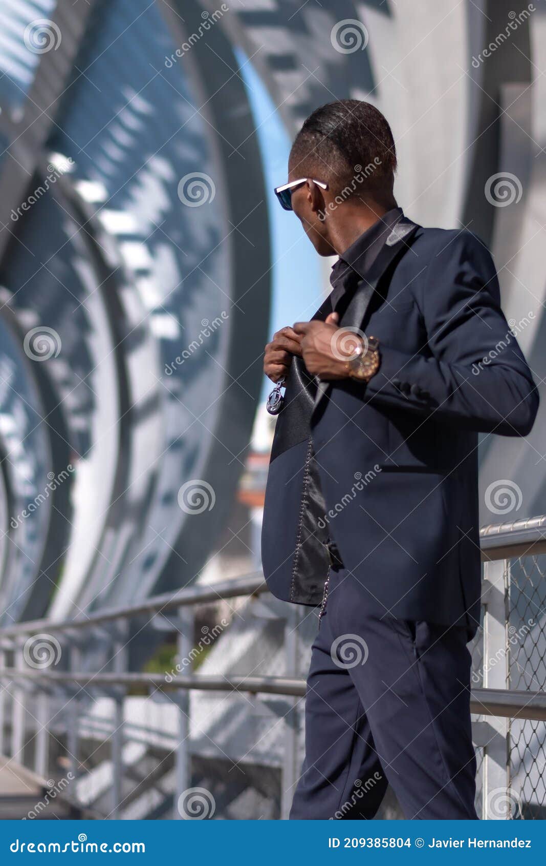 Colored Man in a Suit is Taking Off His Jacket Stock Photo - Image of ...