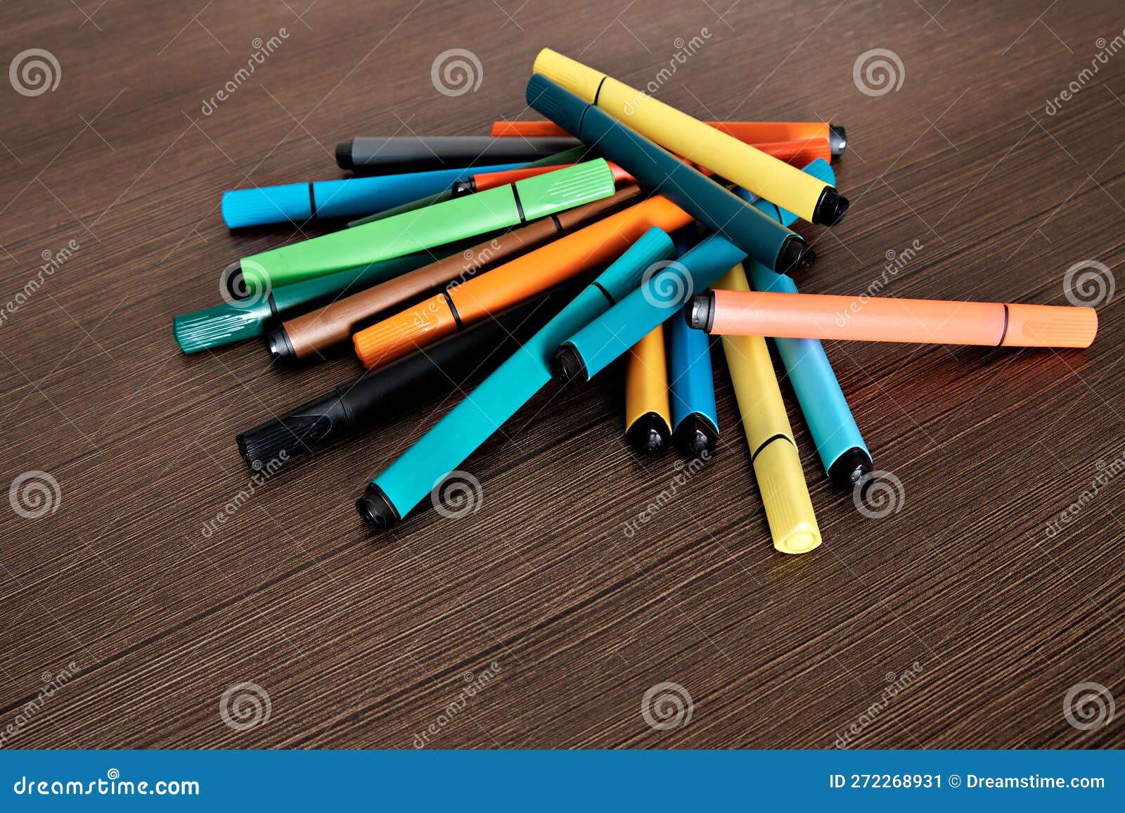 Colored Markers for Drawing are Chaotically Lying on a Dark Table. Up ...