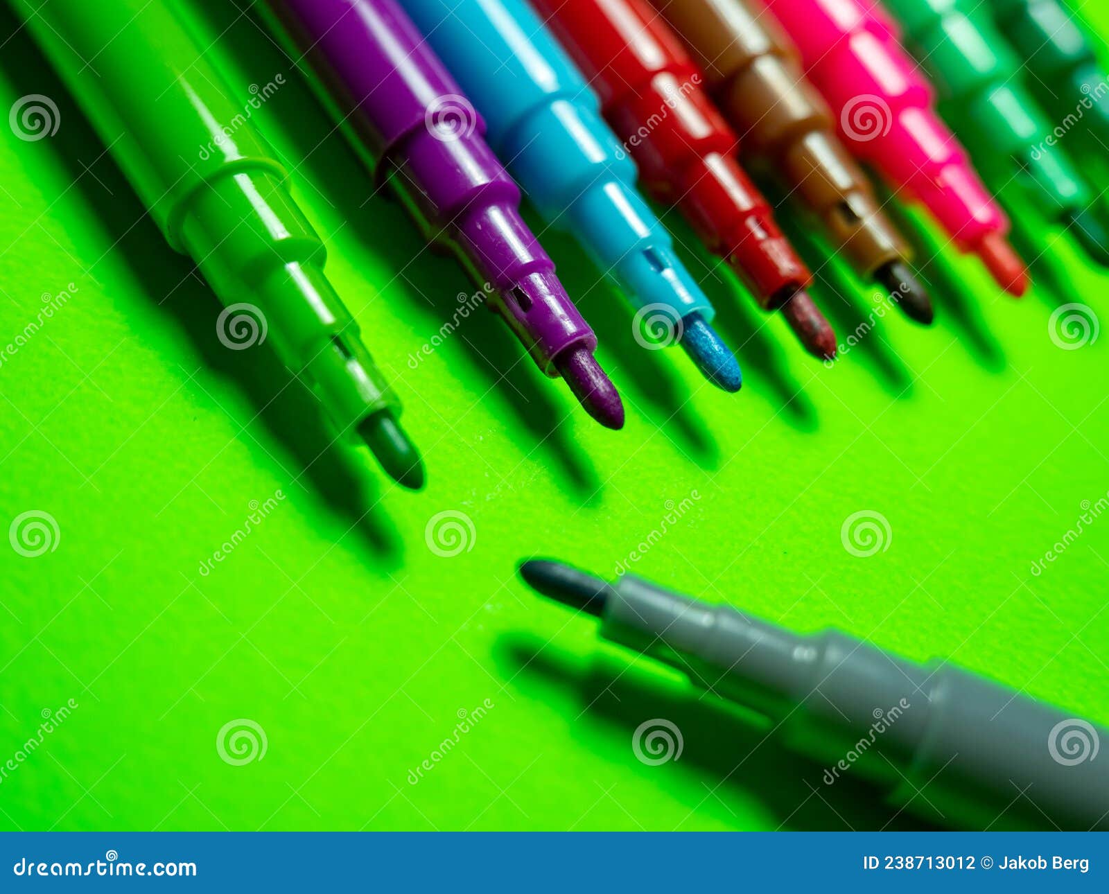Colored Markers on a Green Background Stock Photo - Image of creativity ...