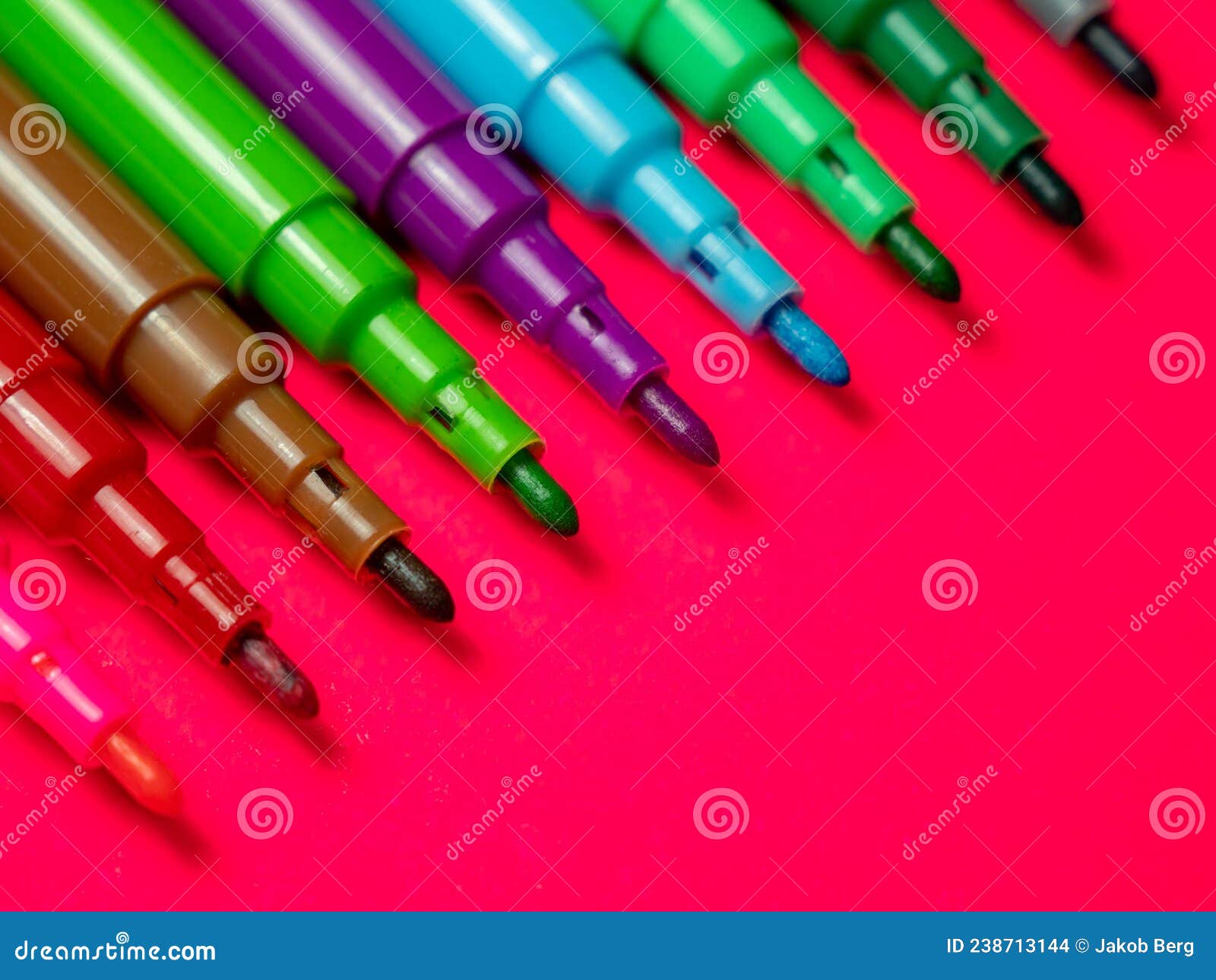 Colored Markers on a Red Background Stock Photo - Image of green, draw ...