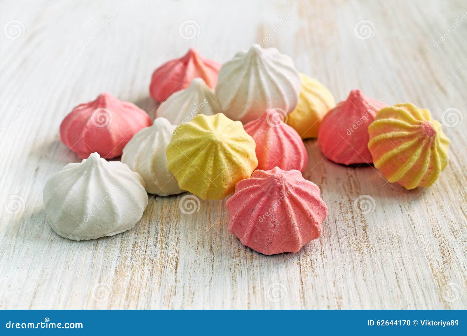 Colored Meringue in a Glass Bowl Stock Photo - Image of white, yellow ...