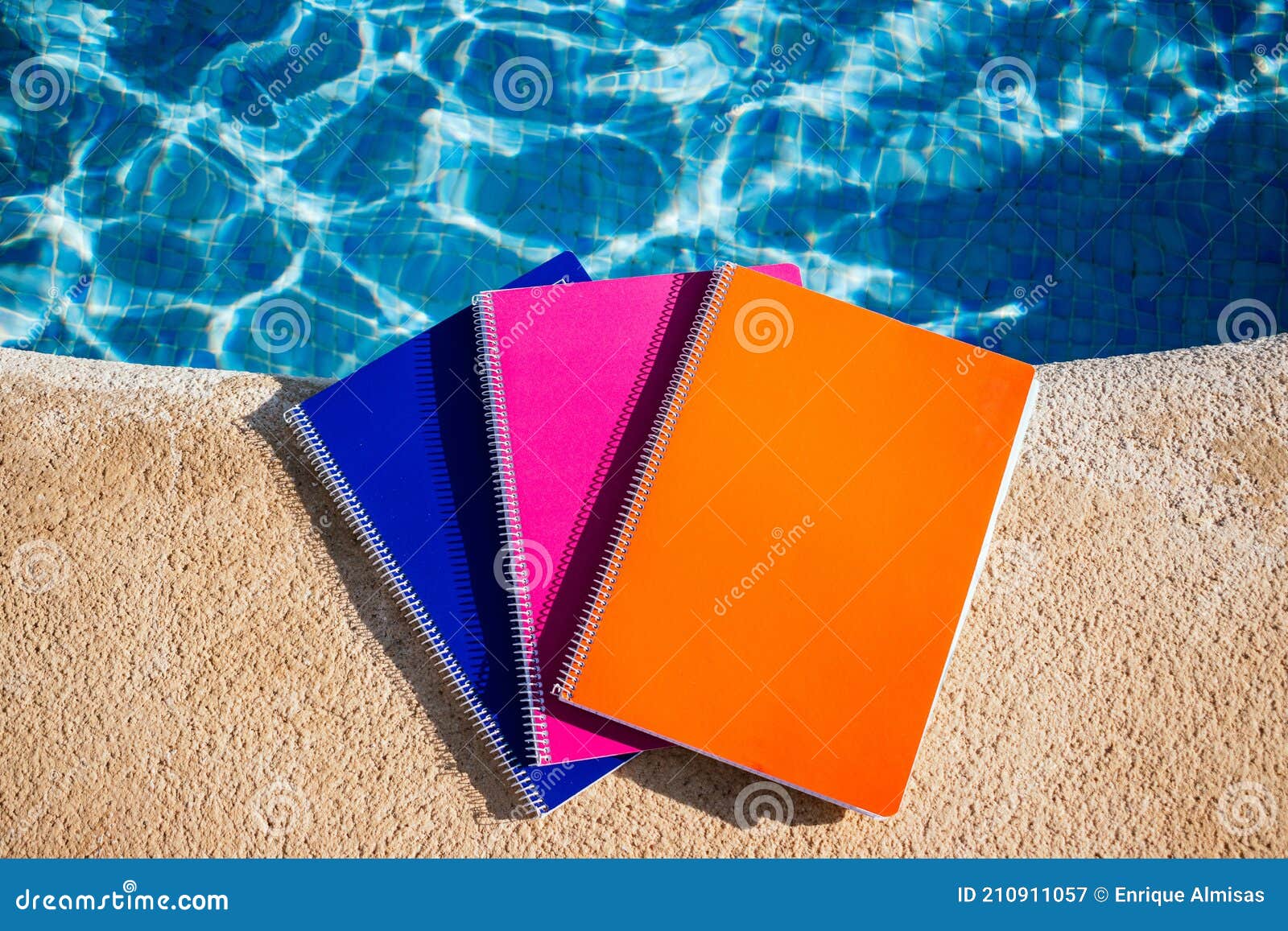Colored Notebooks Next To a Pool Stock Image - Image of orange ...