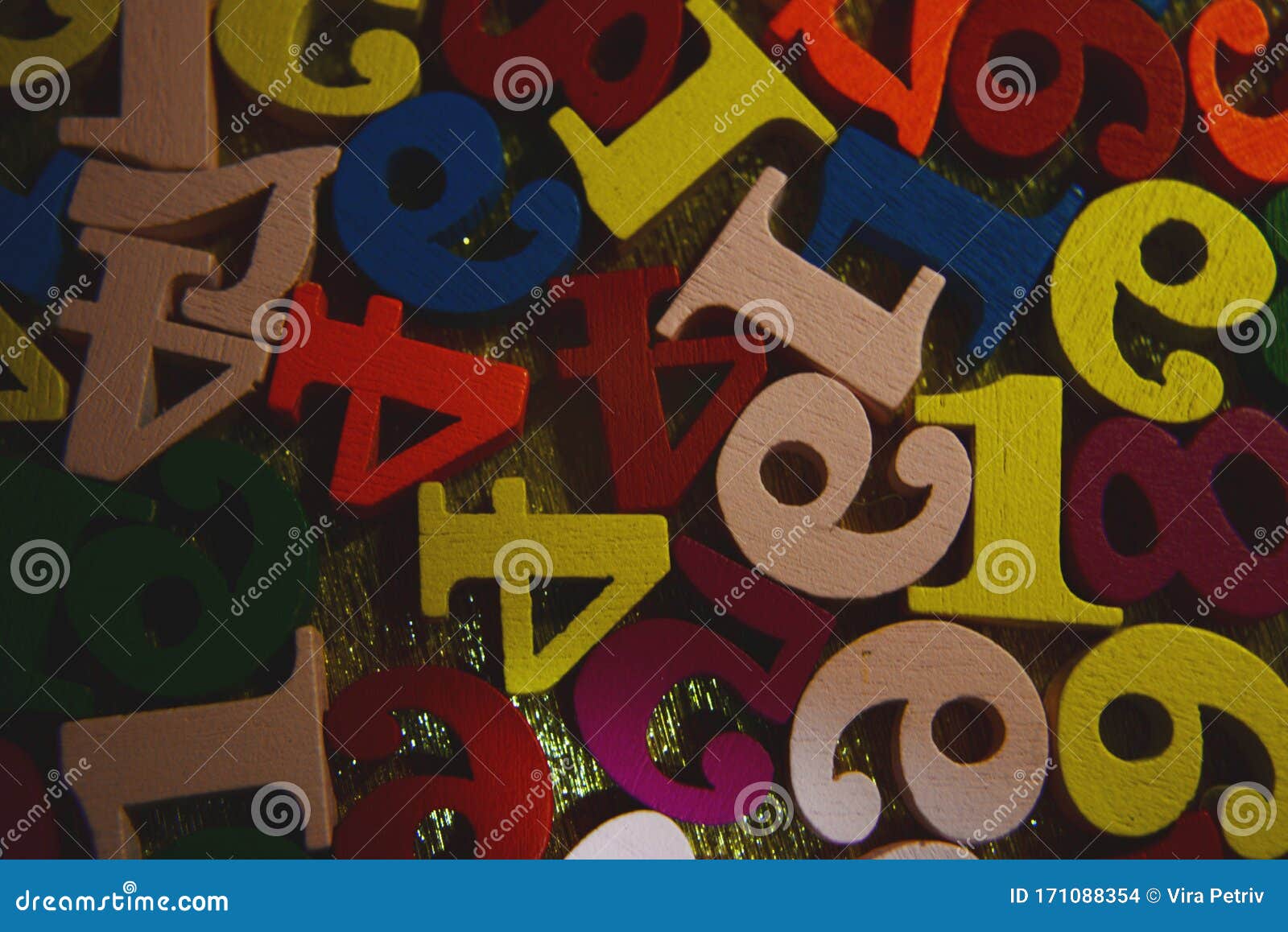 Colored Numbers are Randomly Scattered on a Dark Colored Stock Photo ...