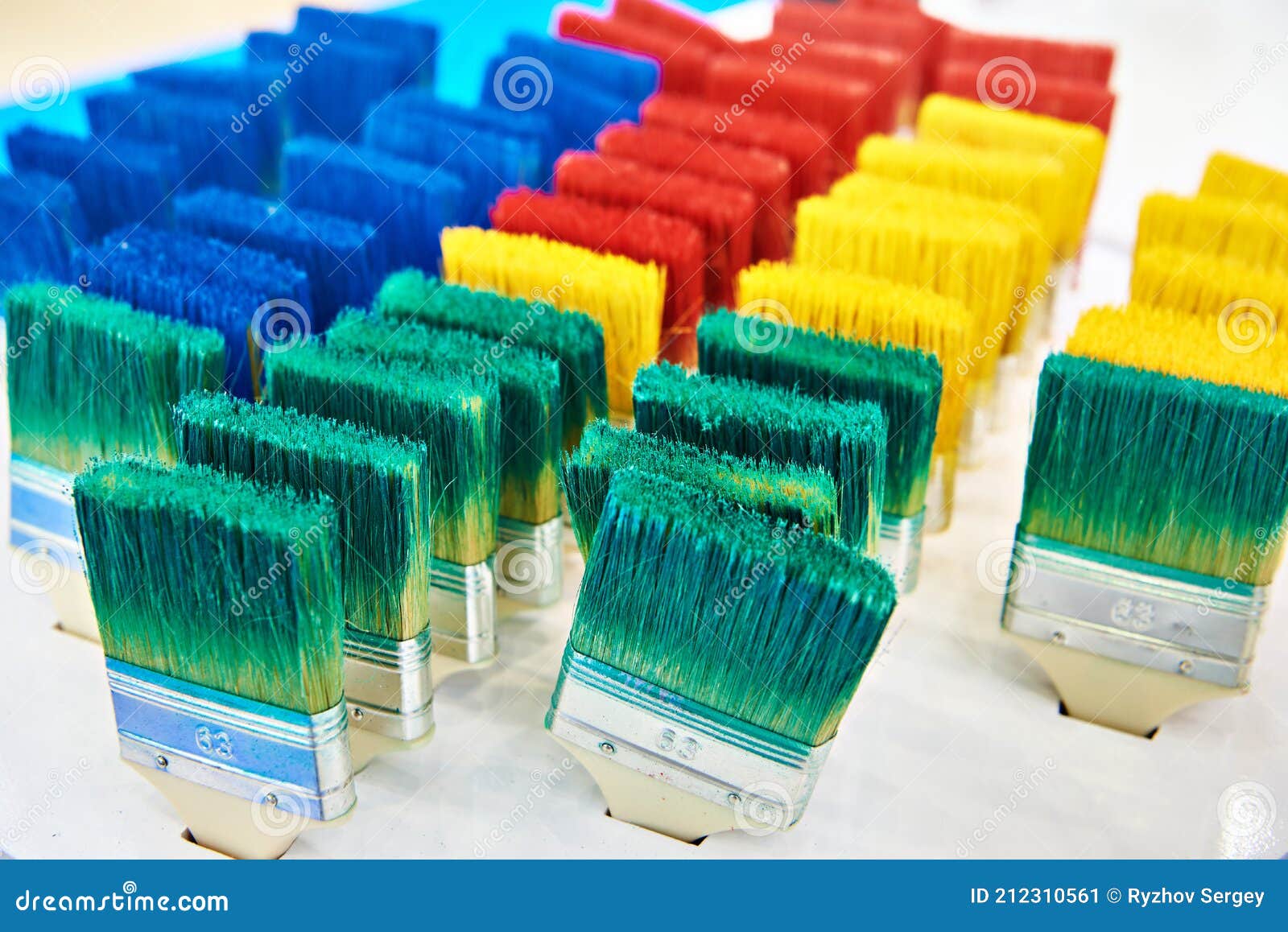 Colored paint brushes stock image. Image of colored - 212310561