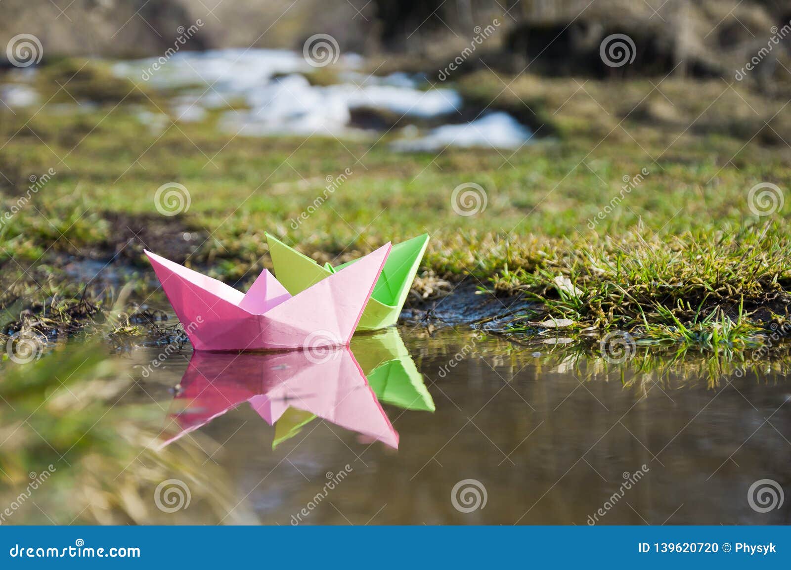 Colored Paper Boats Float in the Early Spring Puddles Stock Photo ...