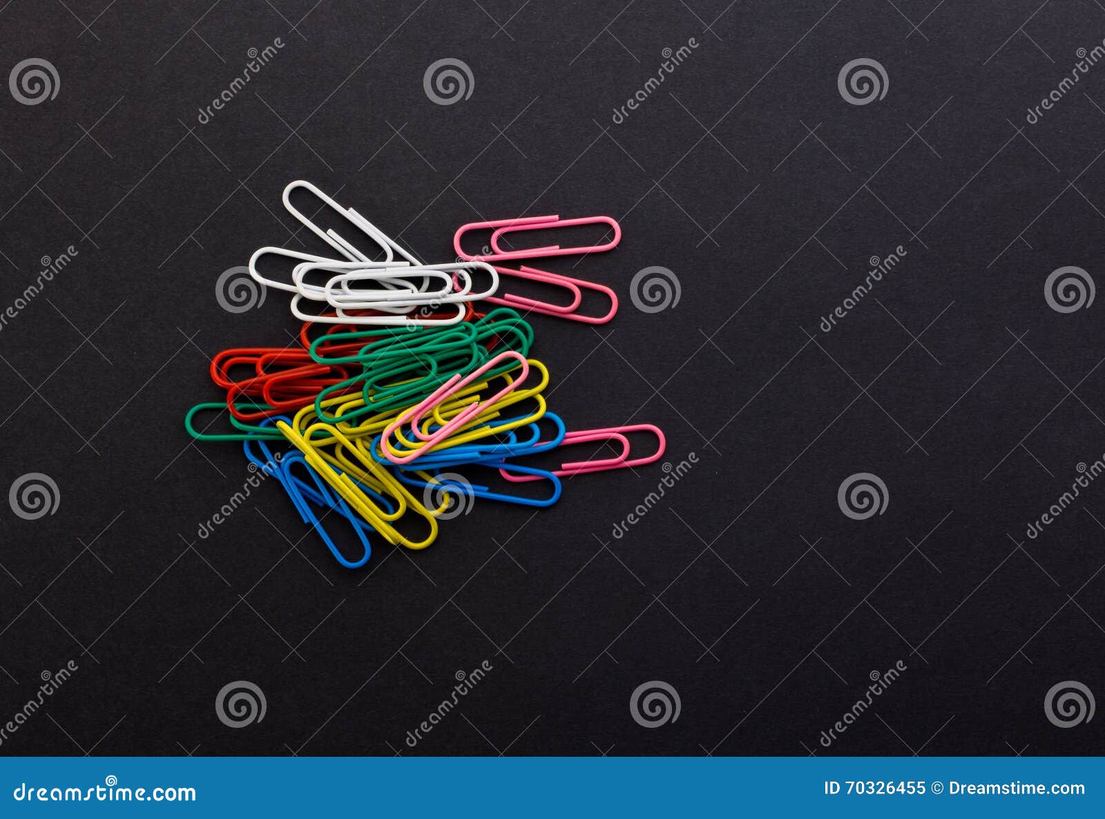Colored Paper Clips on a Black Background Stock Image - Image of black ...