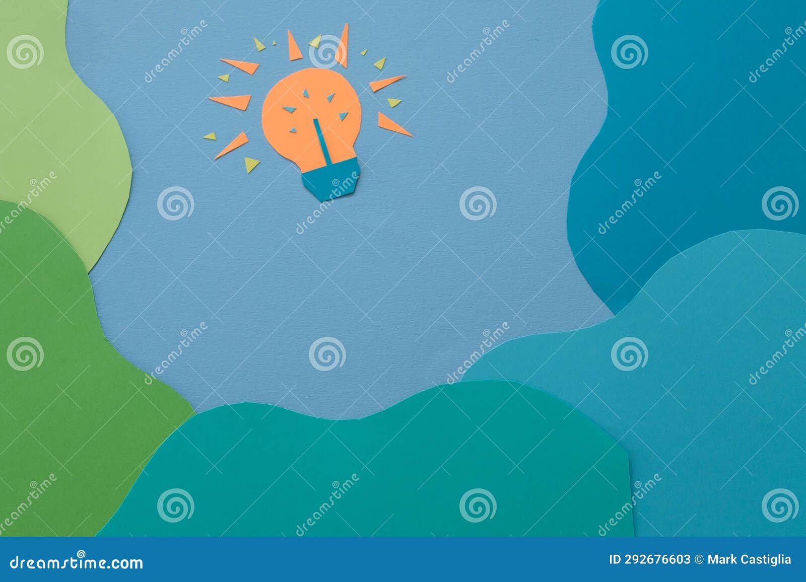 Colored Paper Cut To Resemble Light Bulb and Clouds in Sky Stock Image ...