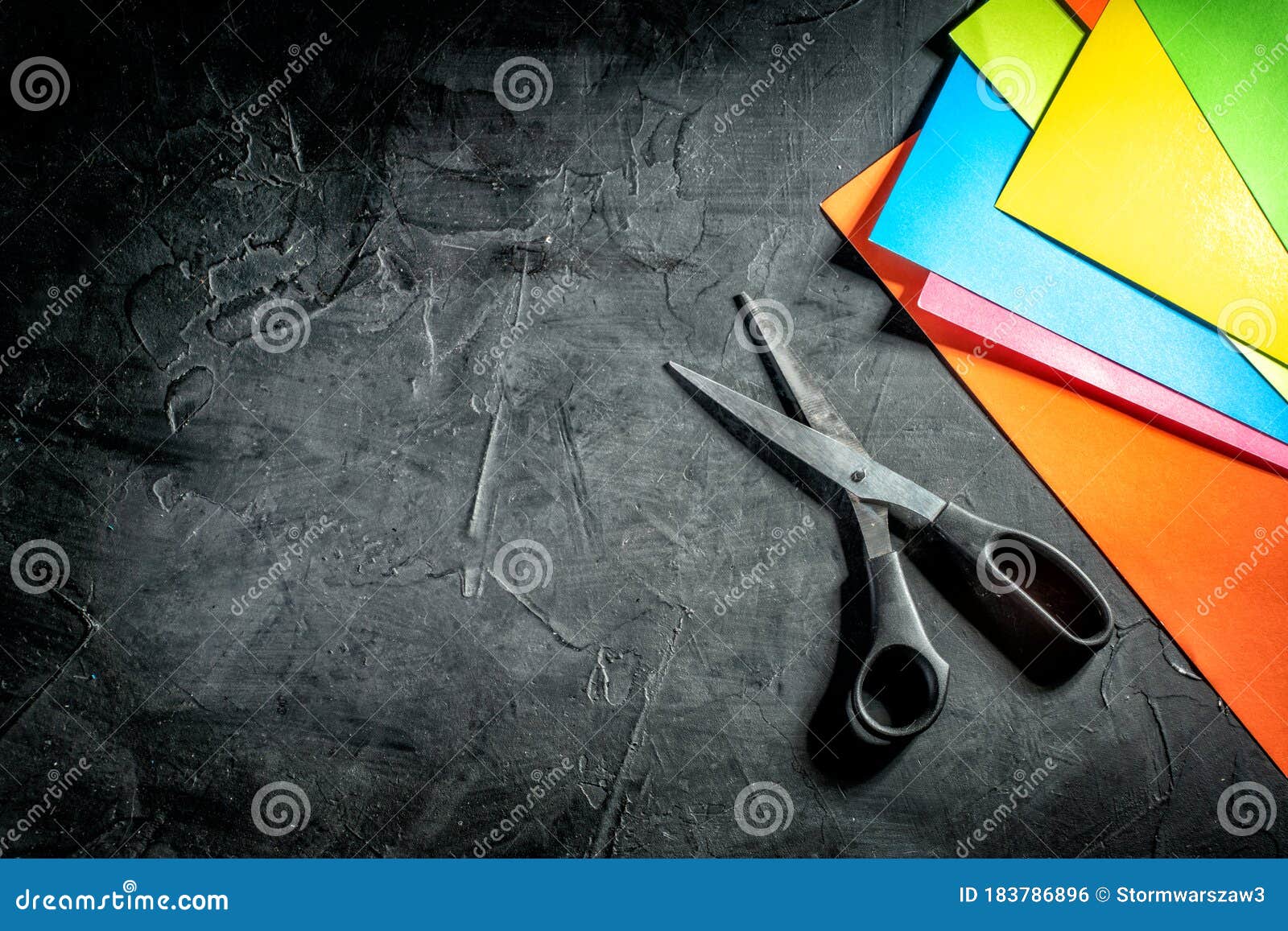 Colored Paper on a Dark Background Stock Photo - Image of element ...