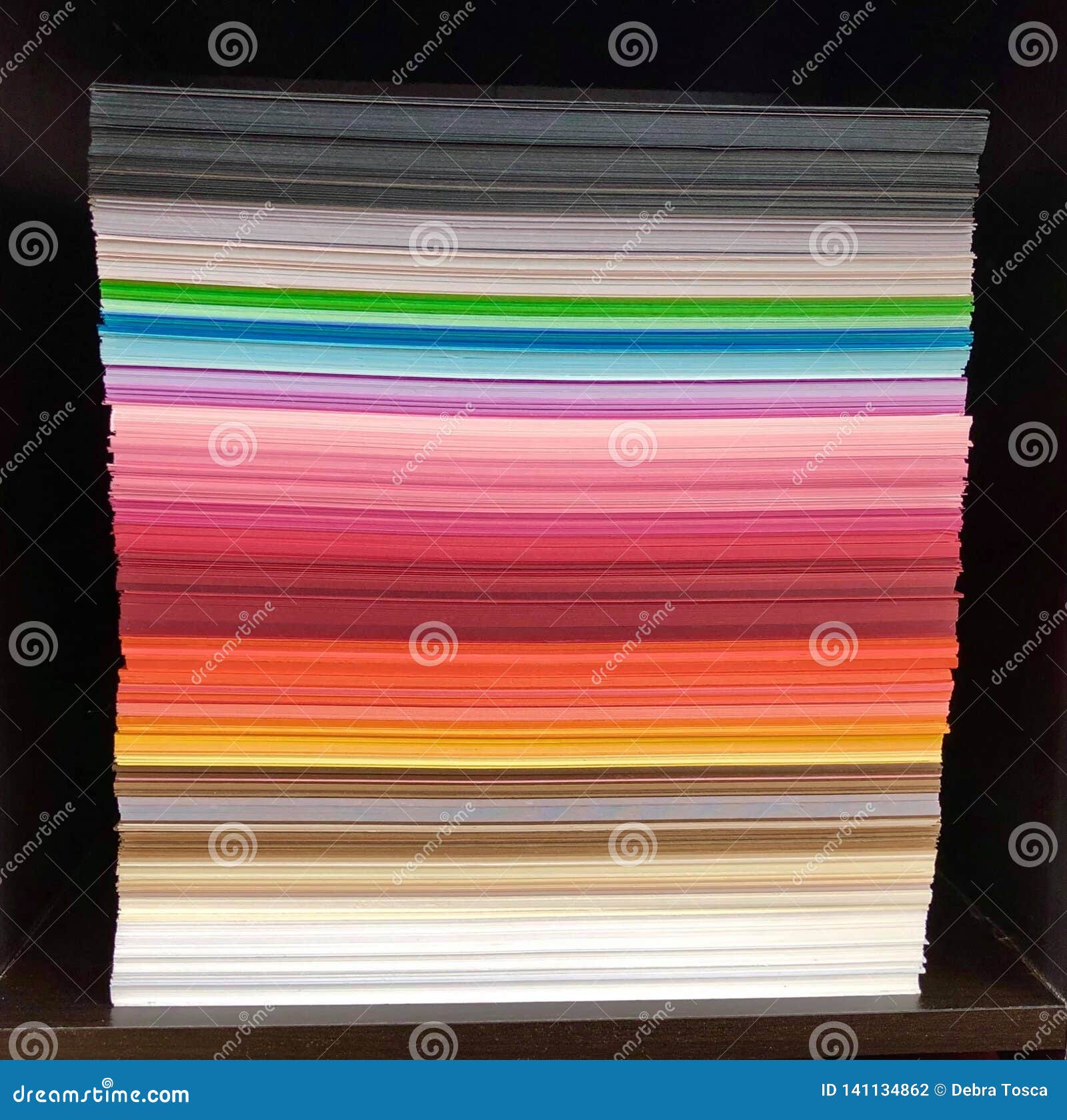 Colored paper stack stock photo. Image of colored, paper - 141134862