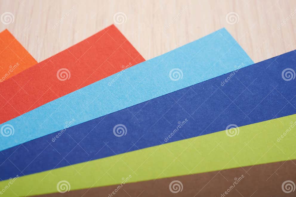Colored Paper Stack on the Table Stock Photo - Image of line ...