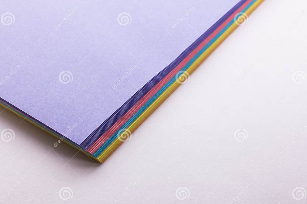 Colored Paper on a White Background Stock Image - Image of stack ...