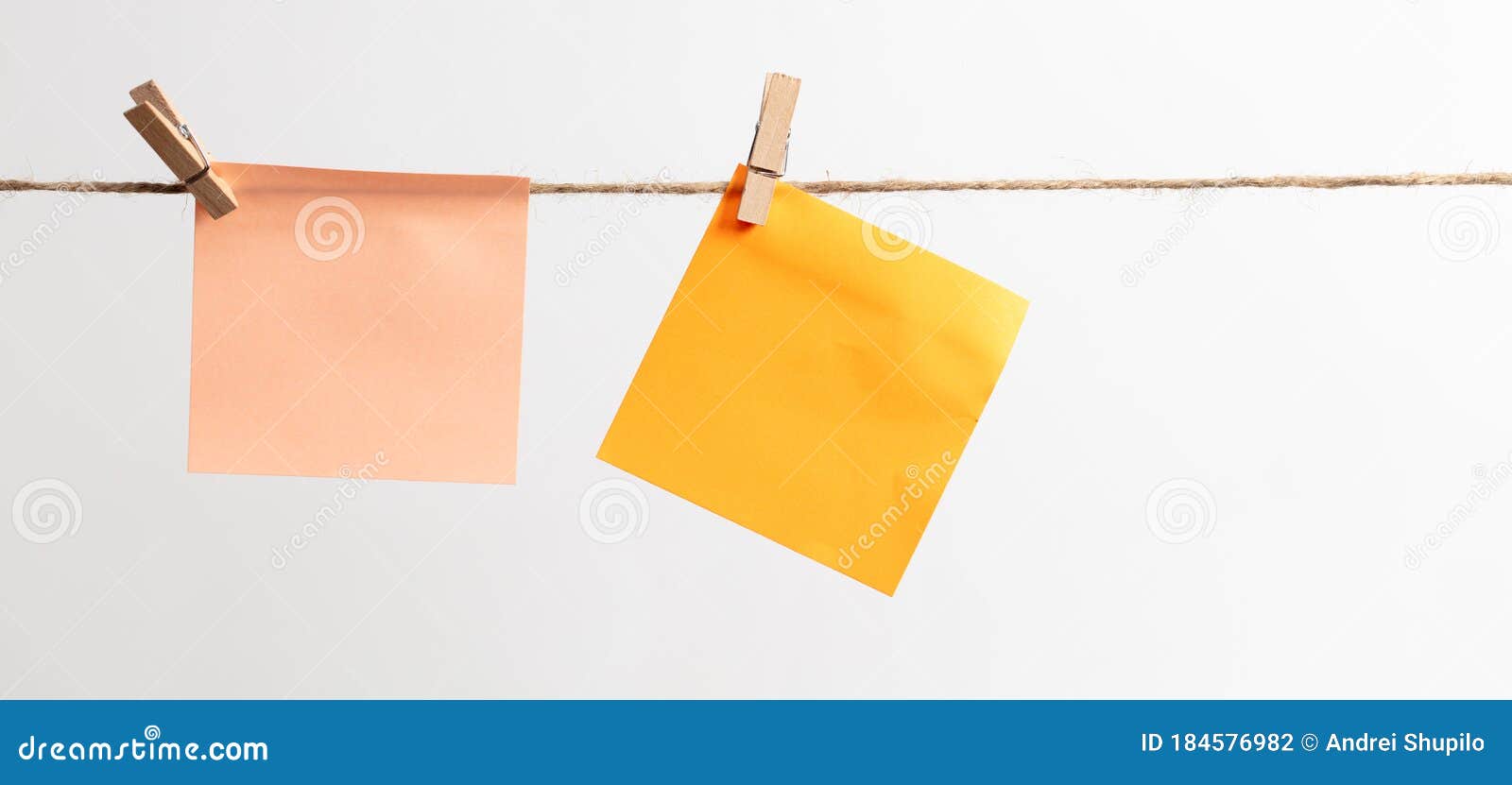 Colored Papers Hang on a Rope on a White Stock Photo - Image of ...