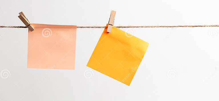 Colored Papers Hang on a Rope on a White Stock Photo - Image of ...
