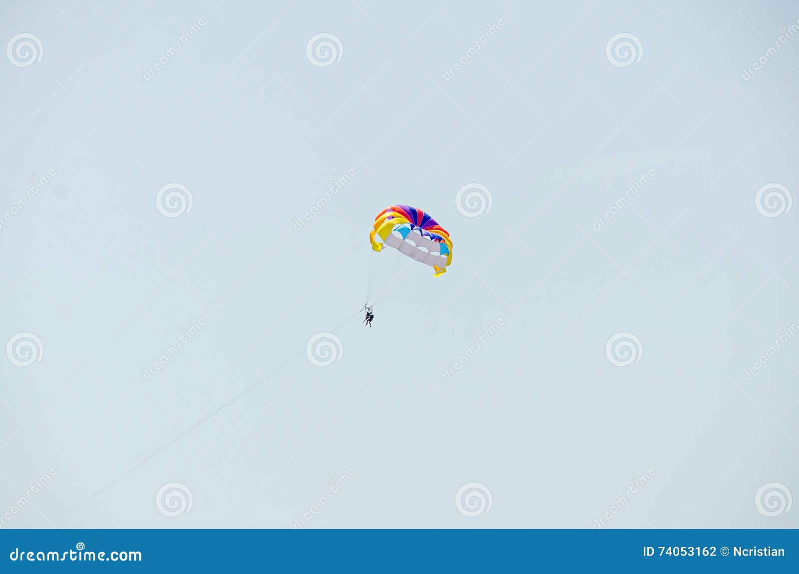 Colored Parasail Wing in the Blue Sky, Parasailing Also Known As Stock ...
