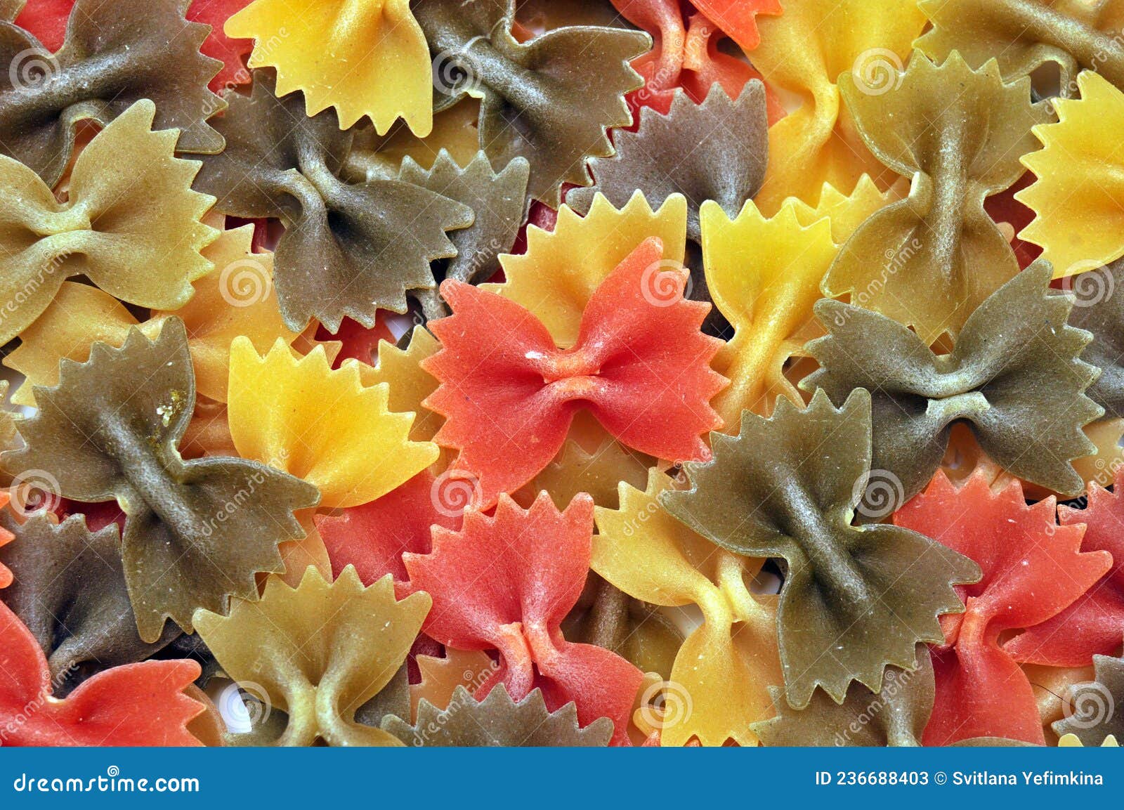 Colored pasta bow closeup stock image. Image of dough - 236688403