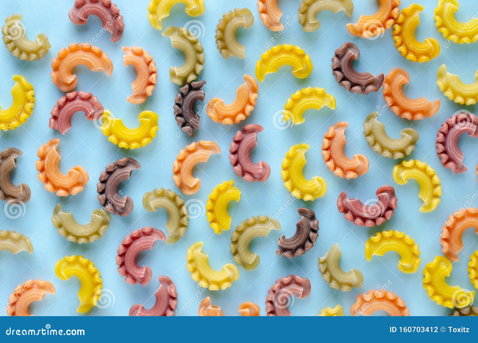 Colored Pasta Composition on Blue Background. Flat Lay Stock Photo ...