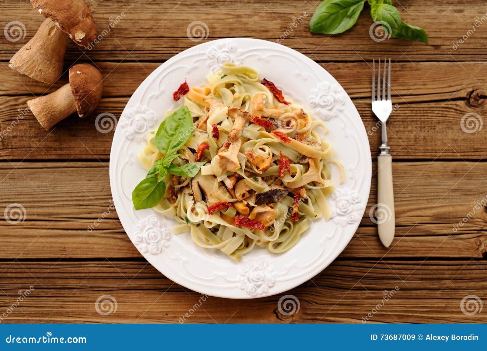 Colored Pasta with Wild Mushrooms and Basil Overhead View Stock Image ...
