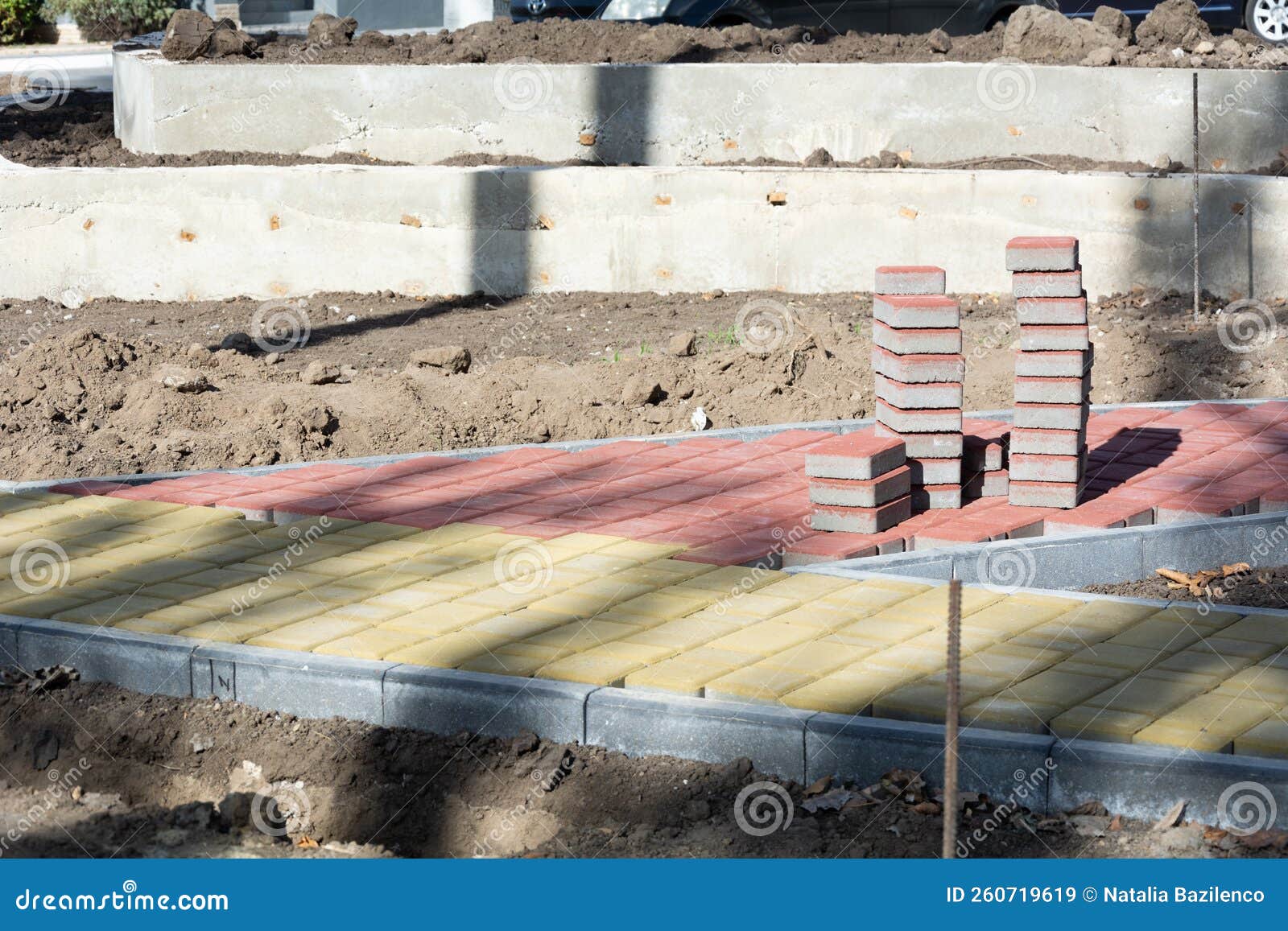 Colored Paving Slabs. Construction of Footpaths from Paving Slabs Stock ...