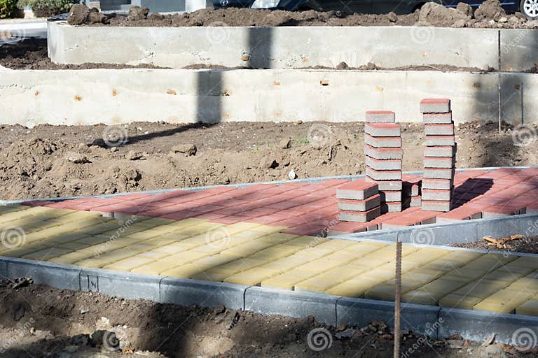 Colored Paving Slabs. Construction of Footpaths from Paving Slabs Stock ...