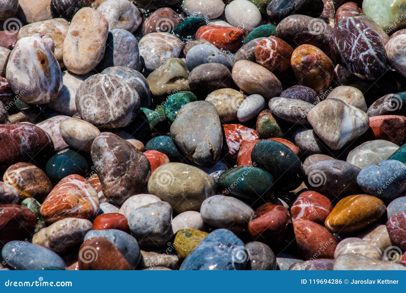 Colored pebbles stock photo. Image of foam, pebbles - 119694286