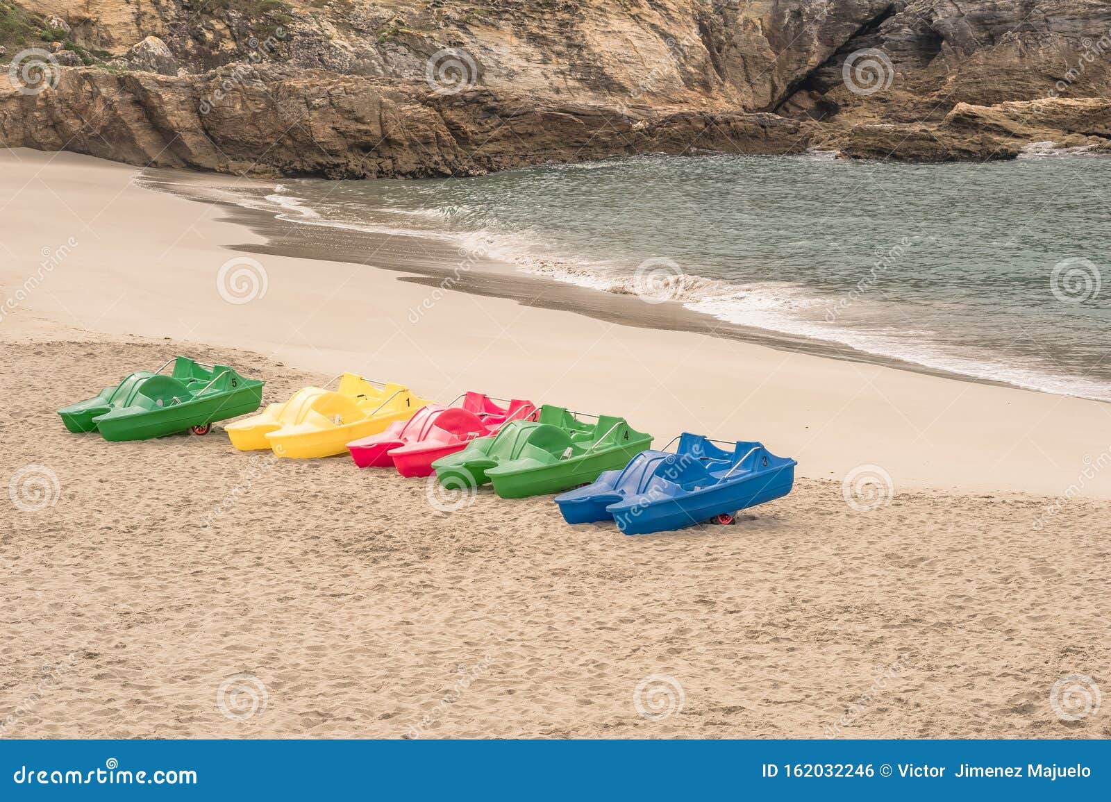 Colored Pedal Boats on Sand Beach Stock Photo - Image of beach, leisure ...