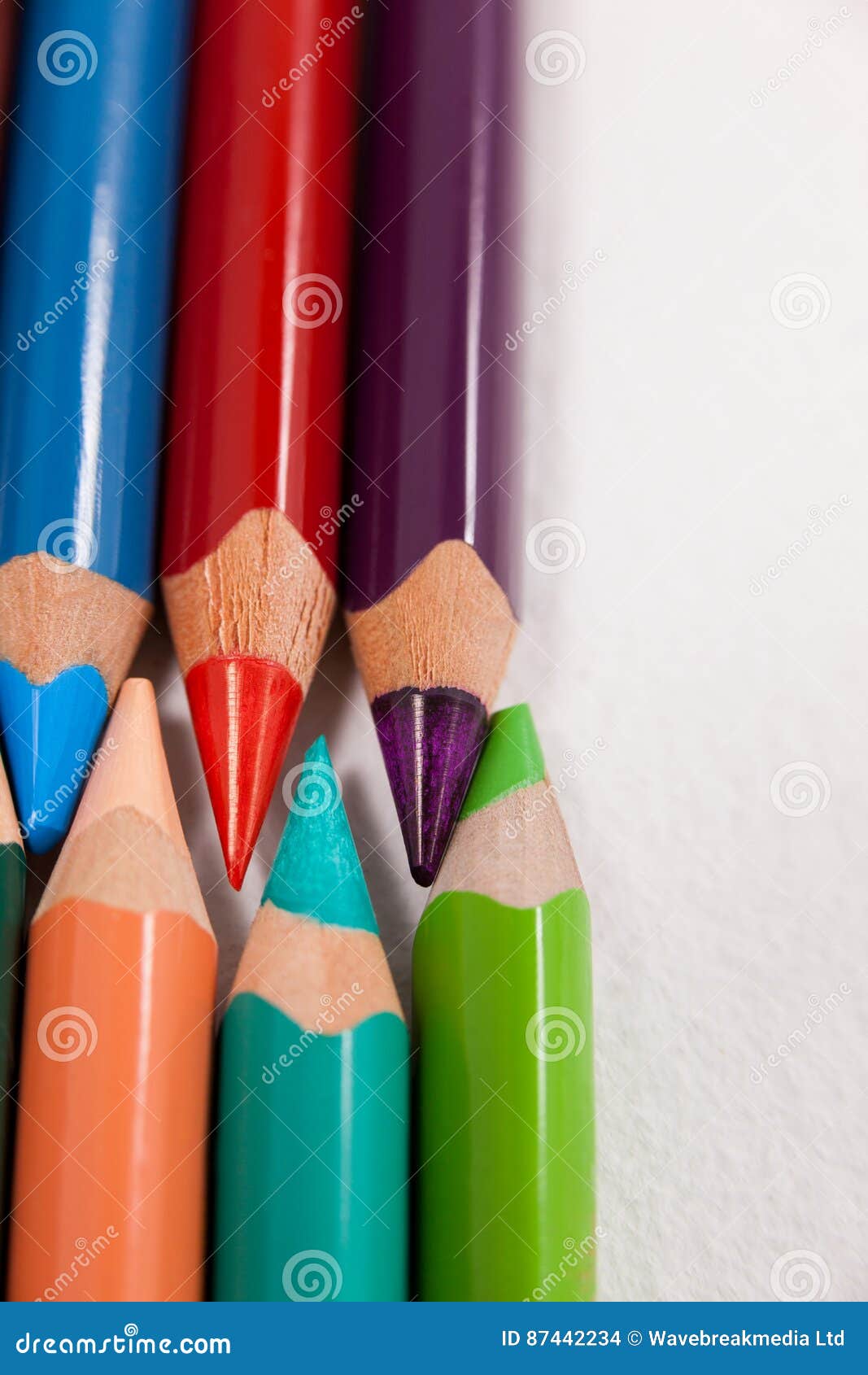 Colored Pencils Arranged in Interlock Pattern on White Background Stock ...