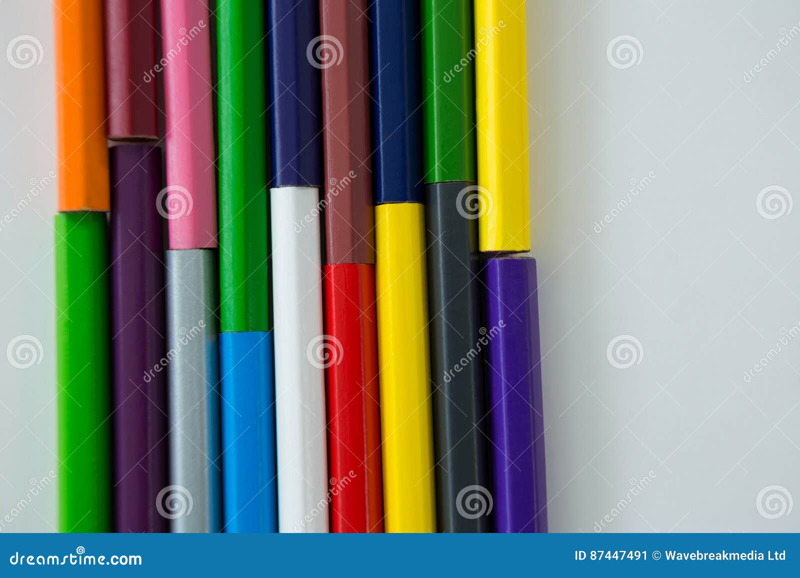 Colored Pencils Arranged in Interlock Pattern on White Background Stock ...